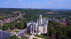 Magic aerial top view flight Hluboká Nad Vltavou is a Fairy tale castle in Czech Republic Europe, summer day 2023. rotation to right drone 4K cinematic.