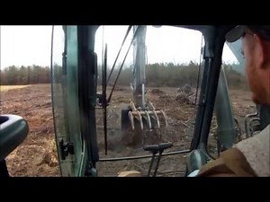 Excavators Stumping A Cutover