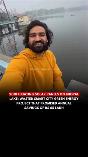 Daily Bharat News on Instagram: "Mayank Tiwari @mak.rants recently spotlighted a serene lake scene from 2018 featuring floating solar panels installed under India’s Smart City initiative in Bhopal. The Rs 3.5 crore project was designed to generate clean energy while achieving annual savings of Rs 65 lakh, exemplifying sustainable innovation for urban communities through renewables, though it now lies abandoned under weeds, highlighting issues of maintenance and accountability. . . . . . . Follow