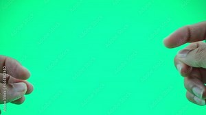 Hand gesture of man hand sign of waiting sign and putting his finger table and fingers He is waiting or thinking something Isolated on green screen background