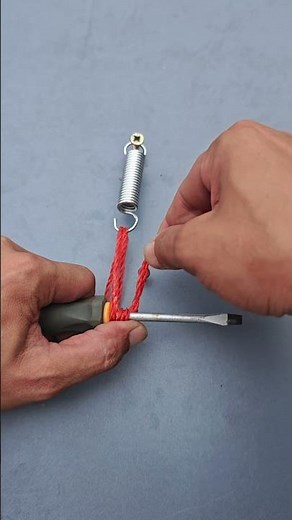 Instalación de resorte con técnica de tracción de cuerda