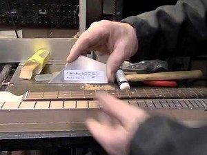 Tech tips from ChickenboneJohn. How to install frets and use a fret rocker.