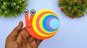 5.4K views · 24 reactions | DIY moving paper toy snail making instructions - Handmade paper craft ideas - Origami ranibow snail #Crafts #PaperToys #Origami | Entertaining Arts | Facebook