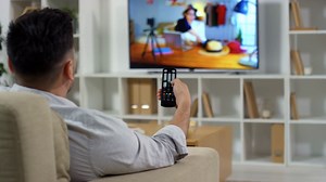 Zoom In Rear View Shot Of Man Sitting On Stock Footage SBV-337951024 - Storyblocks
