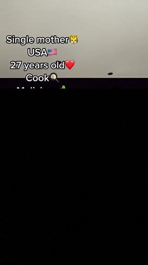 Single Mother Cooking in a Modern Kitchen