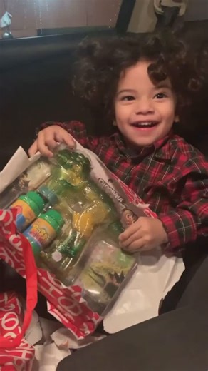 Armando Micro II on Instagram: "2021 I was opening presents with my son Baby Mando in my car. No home. Life was heavy He’s Gone Now….💔🪽 But he’s with me Every step But Today I’m opening presents in my own bed, in my own house, with my son Mars I’ve learned this the hard way… life can go a million different ways. Just don’t give up. Keep going💪🏻❤️"