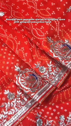 ROOP RANI SAREES on Instagram: "Presenting this Orange special pure Georgette Rai Bandhani Ojariya saree adorned with intricate gotapatti and zardozi hand embroidery, blending timeless tradition with rich craftsmanship. Its vibrant colors and detailed handwork create a stunning statement piece, perfect for festive moments, grand celebrations, and capturing attention with effortless regal charm. Now available to book online on Instagram via DM’s. For any queries, DM us on Instagram or Contact us 