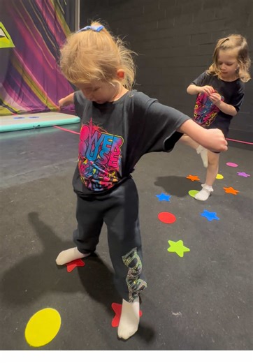 Hopscotch but make it Pom Technique 🩷👯‍♀️ Building sharp motions and early pirouette skills — all through the power of PLAY. #preschool #danceteam #earlyyears #balanceandcoordination #powerhousedanceteam