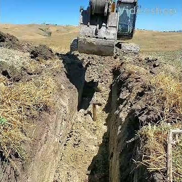 Excavator pushed Modified California split spoon sampler