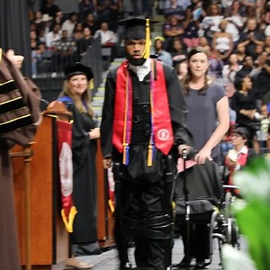 'Anything is possible': Paralyzed student walks across the graduation stage with help from a robotic exoskeleton. Details - https://bit.ly/3pGuywh | FOX19