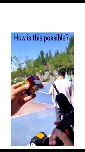 The Virality Kingdom on Instagram: "Hypedrop: the logo you ignore until someone wins a PS5. The Instagram Reel depicts a person using a power drill to scramble a Rubik's Cube, followed by another person solving it rapidly, suggesting an impressive display of speed cubing skills, which aligns with the advanced techniques described in the Fridrich (CFOP) method for solving Rubik's Cubes quickly. The rapid solving of the Rubik's Cube in the video is likely achieved through extensive practice and fa