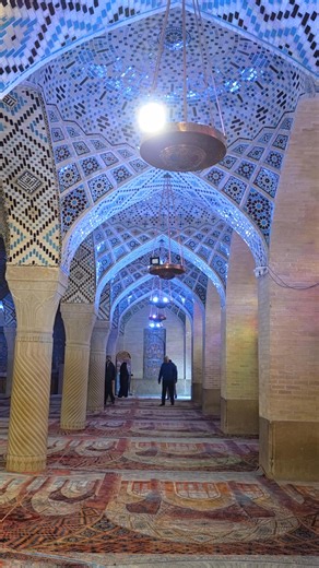 This mosque was built by the Qajar dynasty between 1876 and 1888. People call it the “Pink Mosque” because of all the pink tiles on the ceiling. The outside of the mosque has lots of pretty arches, making the stained glass inside even more special. If you visit in the morning, the sunlight makes the stained-glass floor look extra beautiful. It’s like taking a step back in time and feeling the quiet beauty of the past. | AK International Travels & Tours