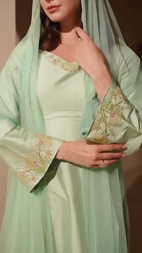 Fatma With Love❤ on Instagram: "Love my engagement dress✨ Elegance in every detail — this pastel mint dress brings together soft pleats, delicate embroidery, and timeless femininity. A look that flows with grace from every angle. A dreamy mint green maxi dress designed with intricate floral embroidery along the sleeves and side panels, complemented by a soft pleated insert for effortless movement. The flared sleeves and smooth silhouette create a refined, feminine look perfect for special moment