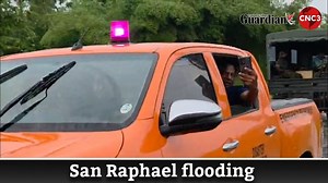 Members of the T&T Regiment and the Tunapuna/Piarco Regional Corporation Emergency Disaster Management Unit navigate through flood waters along the San Raphael Road as heavy rains persist causing the river to burst its banks. Video by Abraham Diaz. | CNC3 Television, Trinidad and Tobago