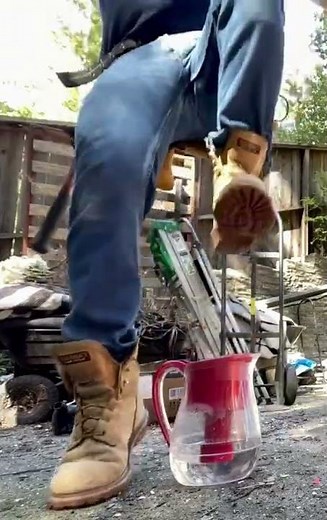 Annihilating a Water Pitcher with my Carolina Logger Construction Boots