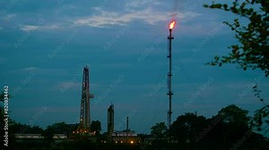 Burning combustion associated gas flare stack tower oil rig refinery plant