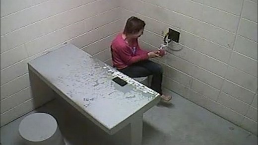 Woman slips out of handcuffs and escapes police station