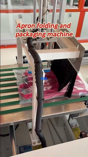 Apron folding packaging machine
