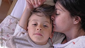 Sweet Scene - Mom And Son In An Embrace, She Caresses His Hair