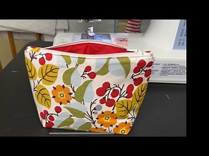 Zipper bag tutorial with zipper tabs and boxed corners