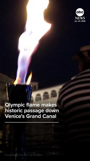 ABC News on Instagram: "The Olympic flame on Thursday made its way through Venice, where torchbearers glided on boats down the Grand Canal and across St. Mark’s Basin, facing the famed Doge’s Palace in one of its most scenic passages ahead of the Milan Cortina Winter Games. Read more at the link in bio."
