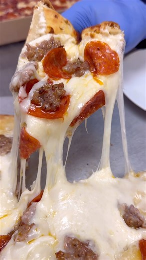 Cheese lovers, rejoice! The Cheese Lava Pie has mozzarella, provolone, feta, and Parmesan exploding from every slice! 🧀🌋🔥🤤 . . . #BurattinoPizza #CheesePull #CheesyGoodness #PizzaLovers #FoodPorn #InstaFood #PizzaLove #Foodie #PizzaTime #Delicious #FoodPhotography #CheesyPizza #PizzaAddict #TastyPizza #PizzaNight #PizzaPerfection #FoodGasm #YummyPizza #EpicPizza #PizzaCravings #FoodHeaven #PizzaLife #CheeseLovers #StretchyCheese #CheesePorn #FoodieFeatures #120pepperoni #MeltyCheese #PizzaSt