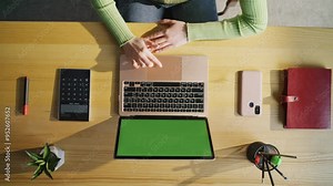 Manager hands swiping touchpad at workdesk closeup. Woman working pc top view