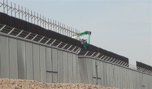 Crews adding to border wall in El Paso