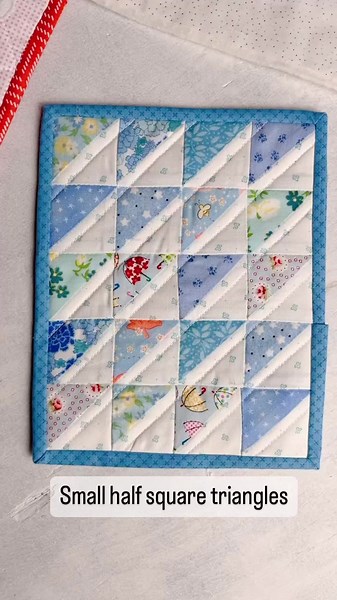 Practicing my half square triangles for an upcoming project! These darling pieces are a great way to use up some scraps in your sewing room! 🪡 Have you ever thought of piecing half square triangles and then keeping them in a stash so that when you are ready to sew a project they are there already made? I love this idea 💡 because sometimes I feel like sewing something, but just don’t want to work on a current project. This way, you can pile them up and have lots when you need them! #halfsquaret