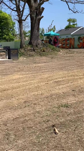 New playground unveiled in Flint along Avenue B on this beautiful Saturday. Check out this muralist hard at work! | Mid-Michigan NOW