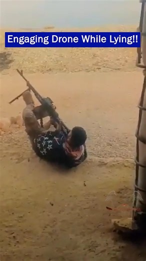 Kurdish Fighter Engages Syrian Drone from a Highly Unusual Position