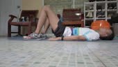 Man doing hip bridge exercise .