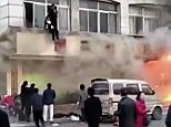 People jump from window to escape a fire at a foot spa in China