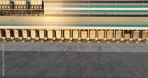 Loading dock at distribution center. Logistics and loading of trucks. Warehouse distribution.