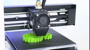 3D printer printing an object from plastic. 3d printer in action.