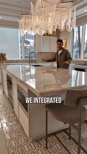 Step into our kitchen glow-up! This backlit, cristallo countertop isn’t just a surface, it’s a whole vibe. Watch how it transforms our space into a one of a kind kitchen countertop! Follow us for more kitchen design inspo! | Thekitchenguy