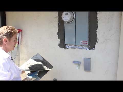 Stucco a newly installed PG&E panel.