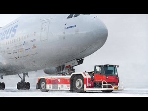 The Insane Amount of Power Pushback Trucks Pack to Move Giant Aircraft