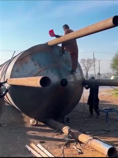 From Sheet to Silo_ The Mesmerizing Process of Building a Steel Behemoth. #machine #shorts #skills #factory