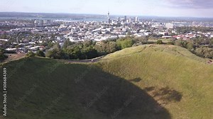Mount Eden, Auckland / New Zealand - December 10, 2019: The Legendary Volcano location of Mount Eden and the skyline of Auckland