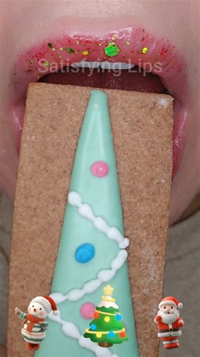 Satisfying Lips® on Instagram: "ASMR Satisfying Eating A Christmas Cookie 🎅 #asmr #christmas #satisfyinglips"