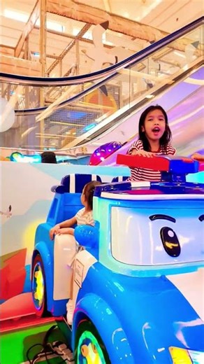 Driving the Blue Neon Police Car Arcade Ride