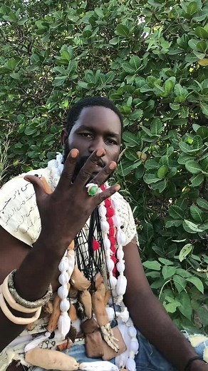 Elegant Accessory Styling in a Lush Green Setting