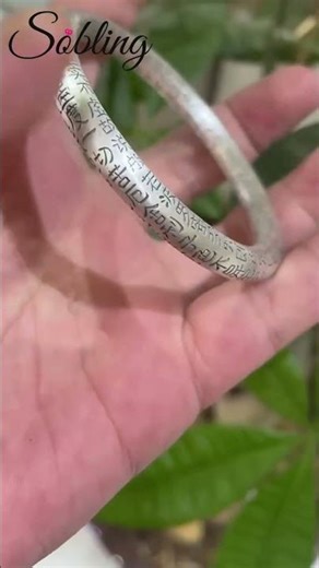 Hand Engraved Heart Sutra Bangle by a Personalized Jewelry Maker
