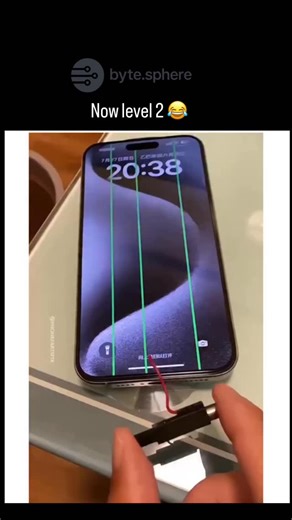Bytes Sphere | Artificial Intelligence | Science on Instagram: "Sometimes the internet gives you hope… and then takes it away 😂 This 12-second clip captures a common smartphone display issue—three vertical green lines appearing on an iPhone screen—followed by a humorous but failed DIY repair attempt. The phone lies flat on a table as a person gently presses an electrical connector against the screen, hoping to fix the display. Surprisingly, the first two presses make one green line disappear ea