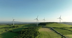 clip-1105388961-aerial-view-powerful-wind-farm-energy-production
