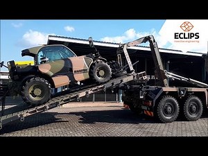 Telehandler loading onto HX77 truck