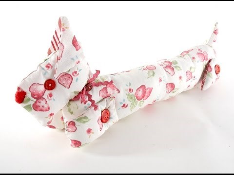 A doggy draught excluder by Debbie Shore