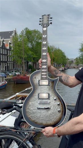 Dazzling Liquid Metal Silverburst @espguitars Eclipse Custom. Would you rock this?? #espguitars #espcustom #especlipse #silverburst #liquidmetal #metalguitarist #metalguitars #guitarporn #guitarsdaily #instaguitar | The Axe Palace