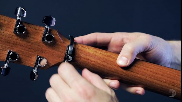 D'Addario Guitar Capo for Acoustic Guitar - Cradle Style Acoustic Guitar Capo - Creates Even Tension - Self Centering Capo Creates Even Tension - Stainless Steel